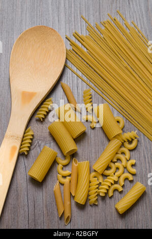 Beautiful Delicious Pastas with Wooden Spoon on Counter Stock Photo - Alamy