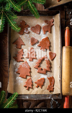 Top view of gingerbread cookies before baking on baking tray Stock ...