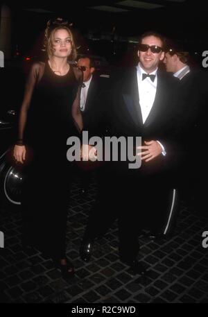 Nicolas Cage and girlfriend Kristen Zang on July 28, 1993 arrive at the ...