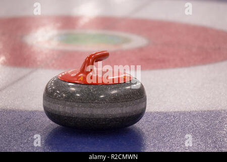 Curling stone on the ice Stock Photo - Alamy