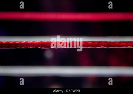 Boxing ring ropes with a blur spotlight Stock Photo - Alamy