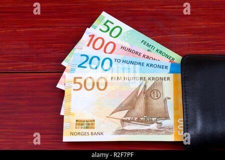 Norwegian money - Krone in the black wallet Stock Photo - Alamy