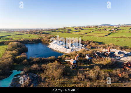 Abandoned lime quarry, buildings and machinery in Bridgend, South Wales ...