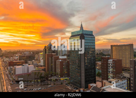 A sunset is seen over the Harare city skyline in Zimbabwe Stock Photo ...