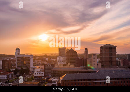 A sunset is seen over the Harare city skyline in Zimbabwe Stock Photo ...