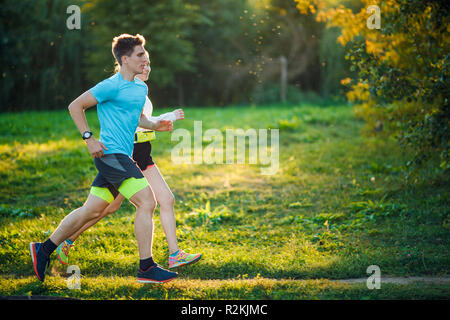 Trainning on a running field Stock Photo - Alamy