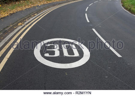 30 mph speed limit road marking on a country road near Bourne End Stock ...