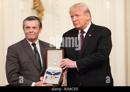 Thomas Stevens, grandson of Babe Ruth, accepts the Presidential Medal ...