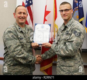 U.S. Air Force Col. Bryan Callahan, left, 435th Air Ground Operations ...