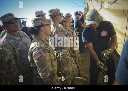 Members of the Saipan Department of Fire and Emergency Medical Services ...
