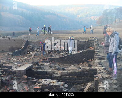Crowds visit the exposed ruins of the demolished Derwent Hall normally ...