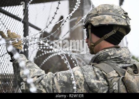 Army engineers with the 887th Engineer Support Company install ...