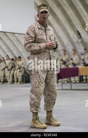 U.S. Marine Col. Jason Perry, left, and Sgt. Maj. Luis Leiva stand at ...
