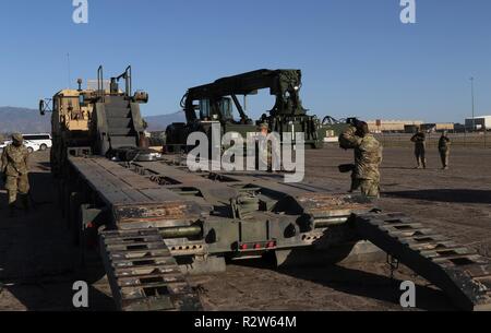 All terrain vehicle with a large trailer in a forest road in the ...