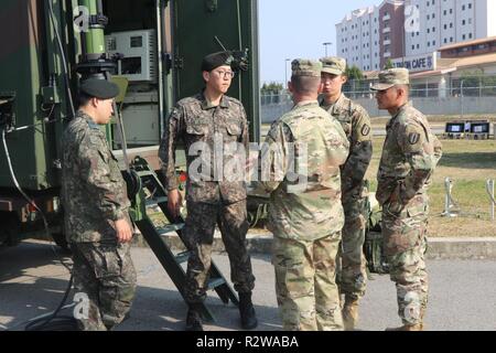 Soldiers from Alpha Company, 304th ESB-E Battalion, receive coins for ...