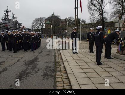 Navy rear admiral places wreath down during Memorial Day ceremony by ...