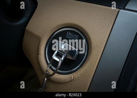 Key in car ignition with steering wheel side view Stock Photo - Alamy