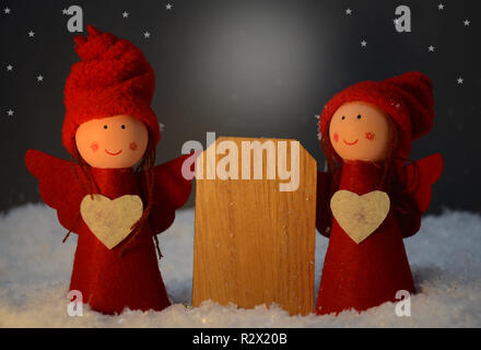 Two christmas angel dolls in a shop window. Cotswolds, England Stock ...