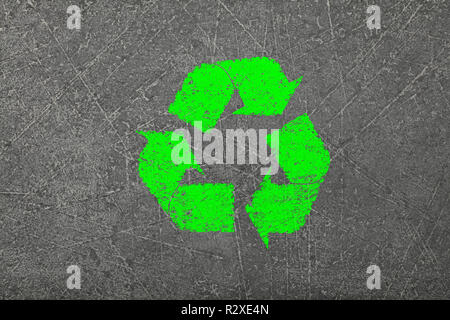 Grunge concrete background with green recycling logo sign Stock Photo ...