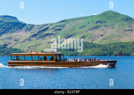 People on board a boat at Derwentwater lake, operated by Keswick Launch ...