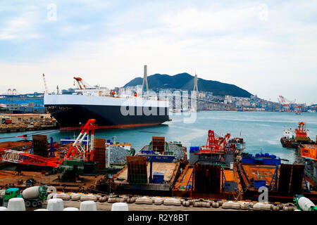 Aerial view of Busan new port of South Korea. Container ship in import ...