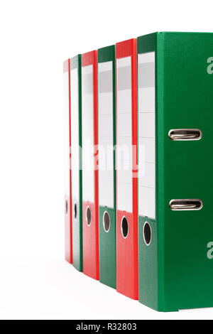 Red file folders, tax office, tax audit, hand with stamp studio ...