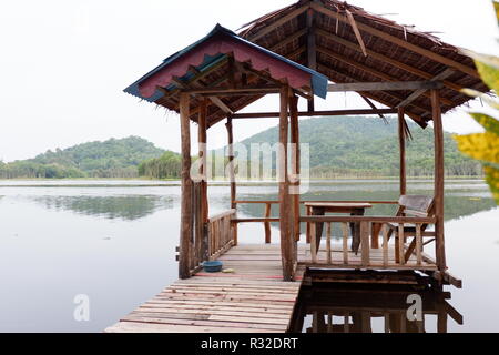small wooden fishing hut on the lake Stock Photo - Alamy