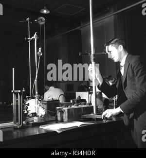 1950s, historical, young adult science undergraduates using microscopes ...