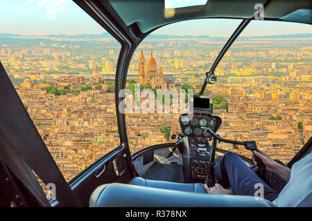 Helicopter cockpit flying on Paris Tour Eiffel tower skyline. Scenic ...