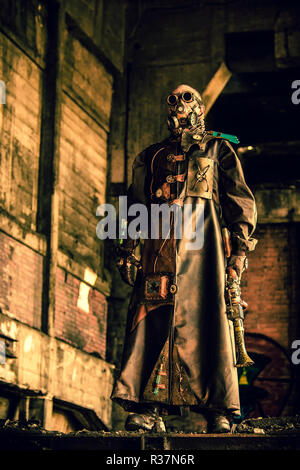 Steampunk man stands guard Stock Photo - Alamy