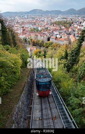 Modern funicular climbing to Schlossberg and Graz city panoramic view ...
