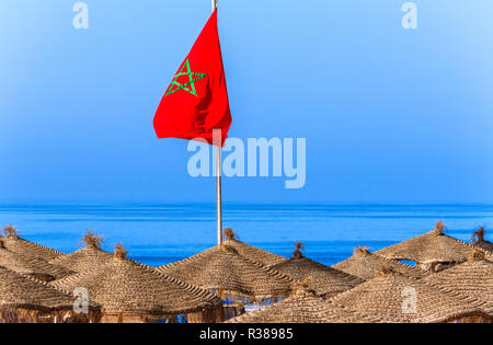 flag of Morocco on beach in Agadir city, Morocco Stock Photo - Alamy