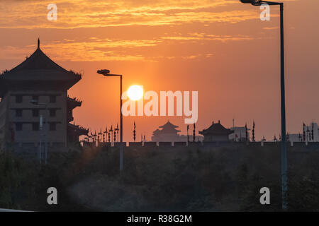 View of Xian city wall at sunrise Stock Photo - Alamy