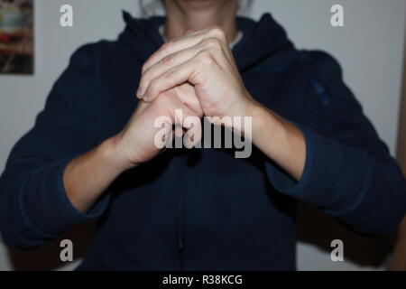 Cracking Knuckles, Female Stock Photo - Alamy