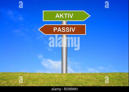 Active and passive signpost Stock Photo - Alamy