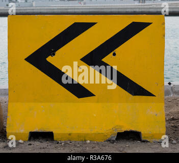 Yellow diversion sign board with black Right pointing arrow Stock Photo ...