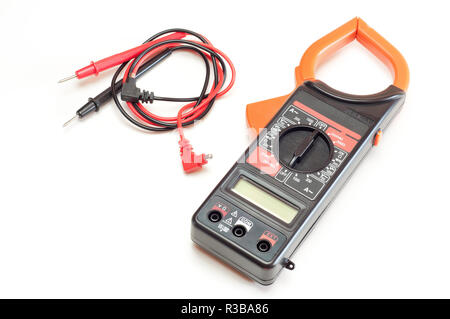 Electric multimeter with red and black probe, display indicating zero ...