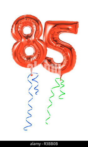 Happy Birthday number 85 celebration candle with colorful balloons and ...