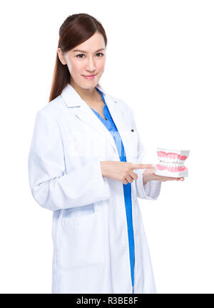 Photo of pretty cheerful lady indicate finger empty space blank ...