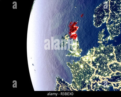 Satellite view of Scotland at night with visible bright city lights ...