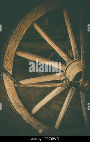 Color image of a old wooden cart wheel Stock Photo - Alamy