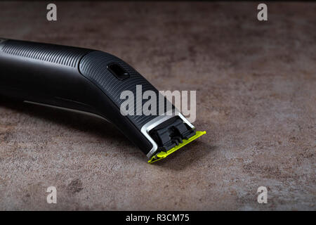 Electrical shaver on a dark background Stock Photo - Alamy