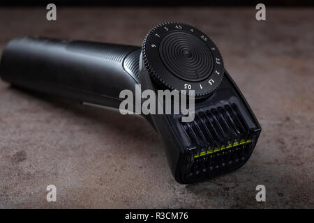 Electrical shaver on a dark background Stock Photo - Alamy