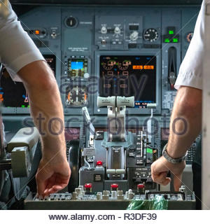 Cockpit of a Boeing 737 - 700 in a central console with hand Stock ...