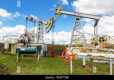 Nurlat, Russia - June 10, 2018: Working pump jack fracking crude ...