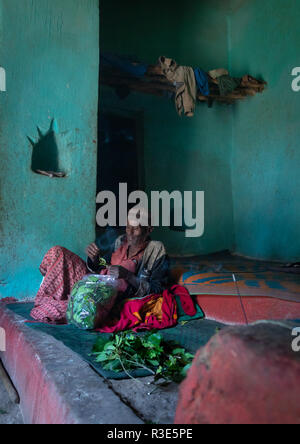 Harari man chewing khat inside an old house, Harari Region, Harar ...