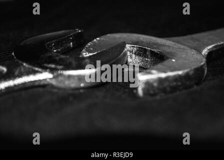 Abstract wrenches placed together with black surrondings Stock Photo ...