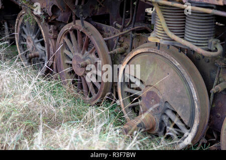 Old destroyed steam engines. Forgotten railway station in central ...