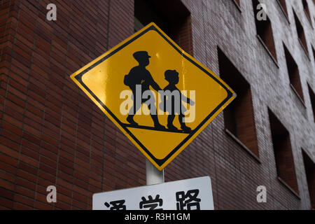 Reflective traffic sign school crossing symbol ahead Stock Photo ...