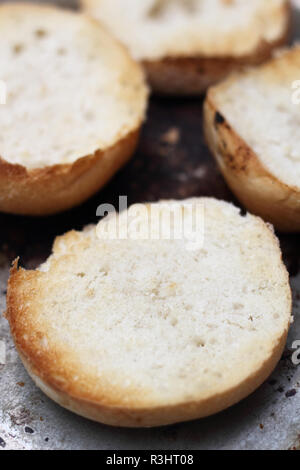 Toasted halves of bread rolls Stock Photo - Alamy